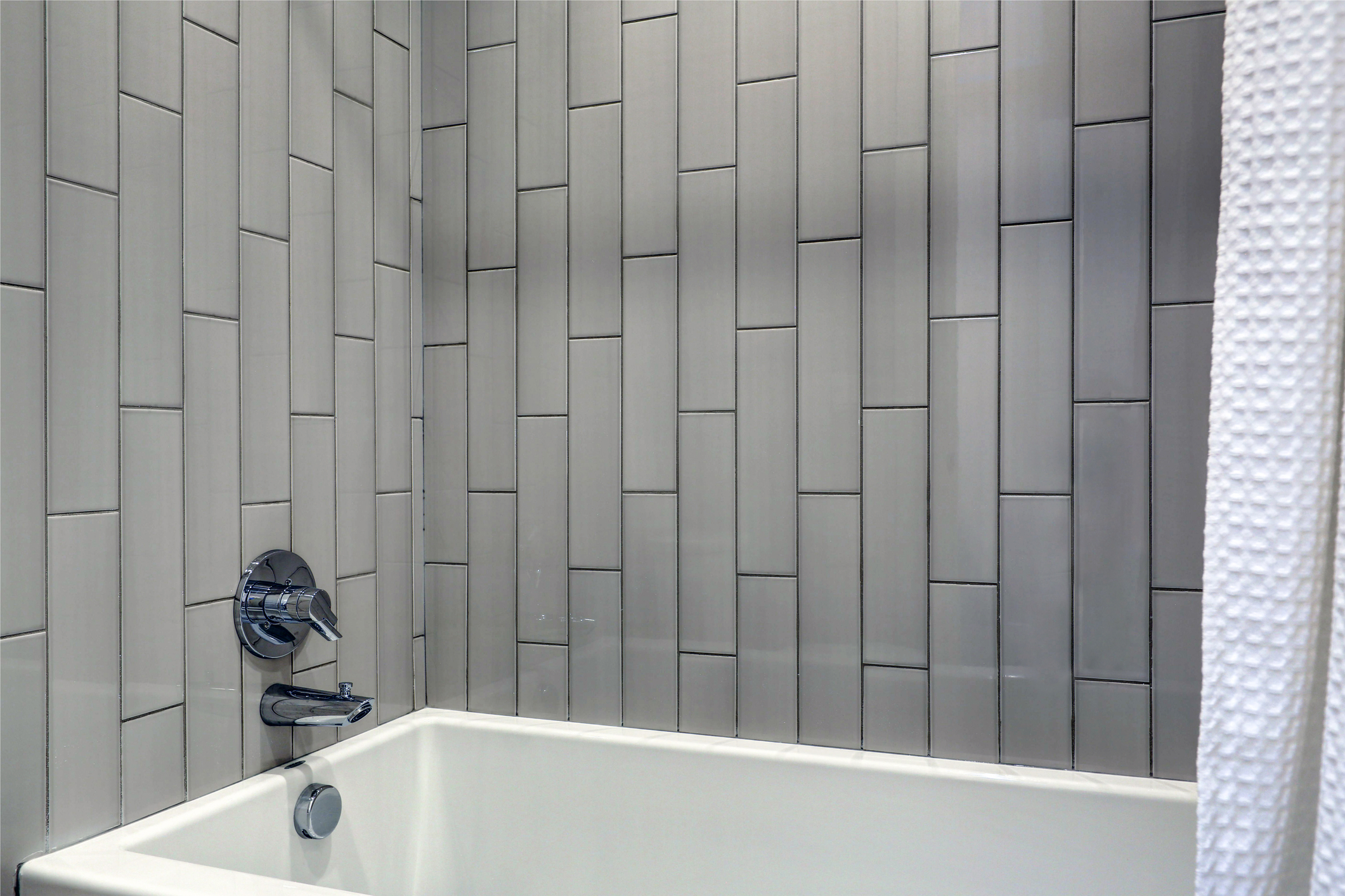Can I Glue a Tub Surround Over Existing Tile? - Glamorous Place